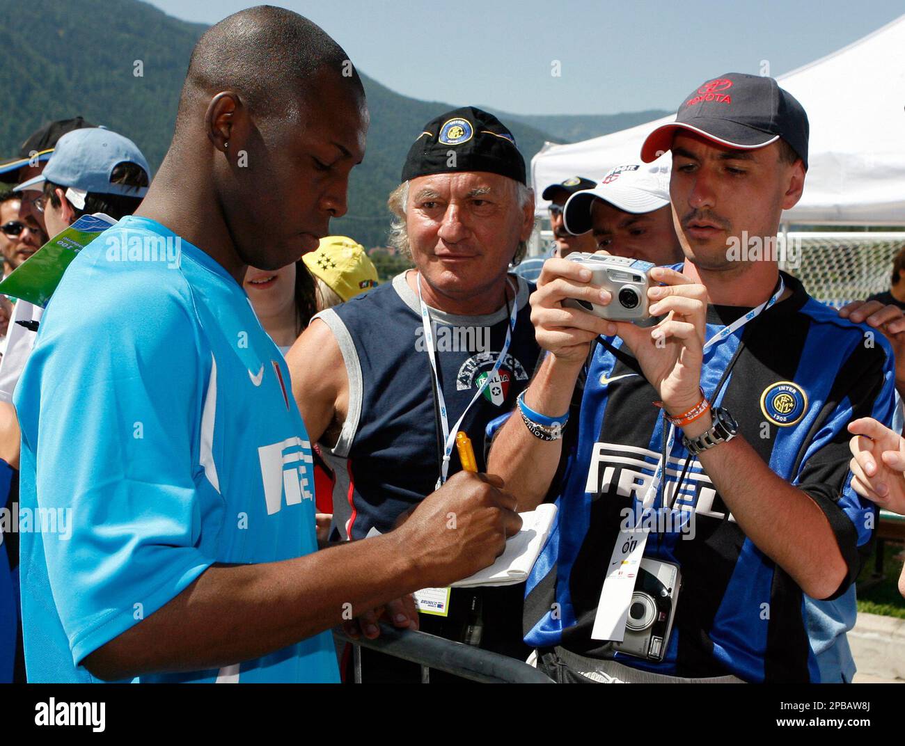 Inter Milan's Nelson Rivas of Argentina signs an autograph for a fan ...