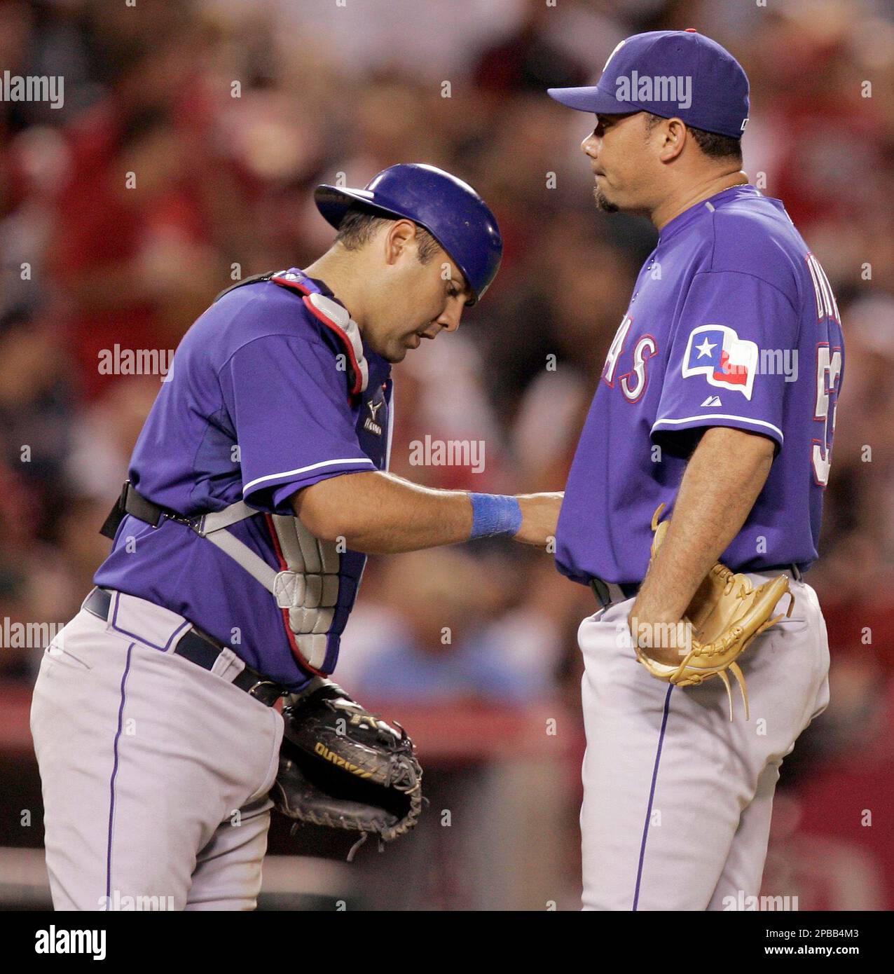 Texas Rangers catcher Gerald Laird, left, consoles Joaquin Benoit as he ...