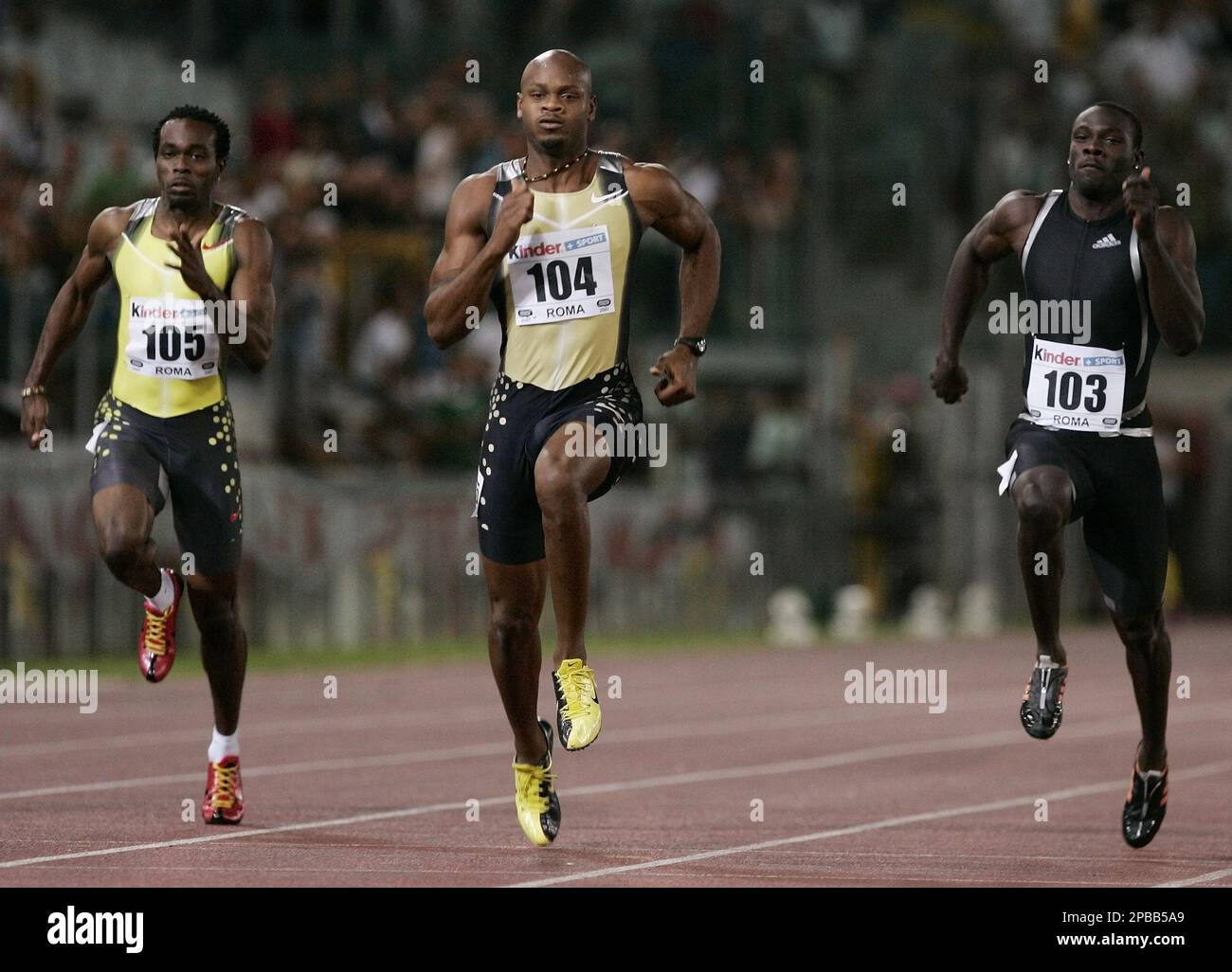 Jamaica's Asafa Powell, center, Bahamas Derick Atkins, right, and ...