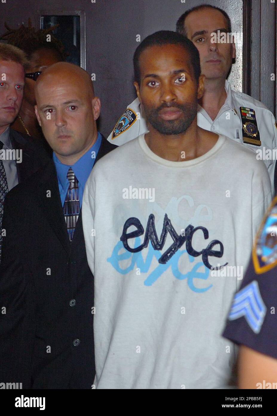 Robert Ellis is escorted into Criminal Court in New York, Friday, July ...