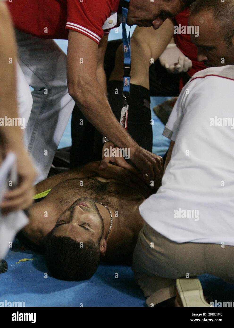 Long Jump athlete French Salim Sdiri is treated by paramedics after ...
