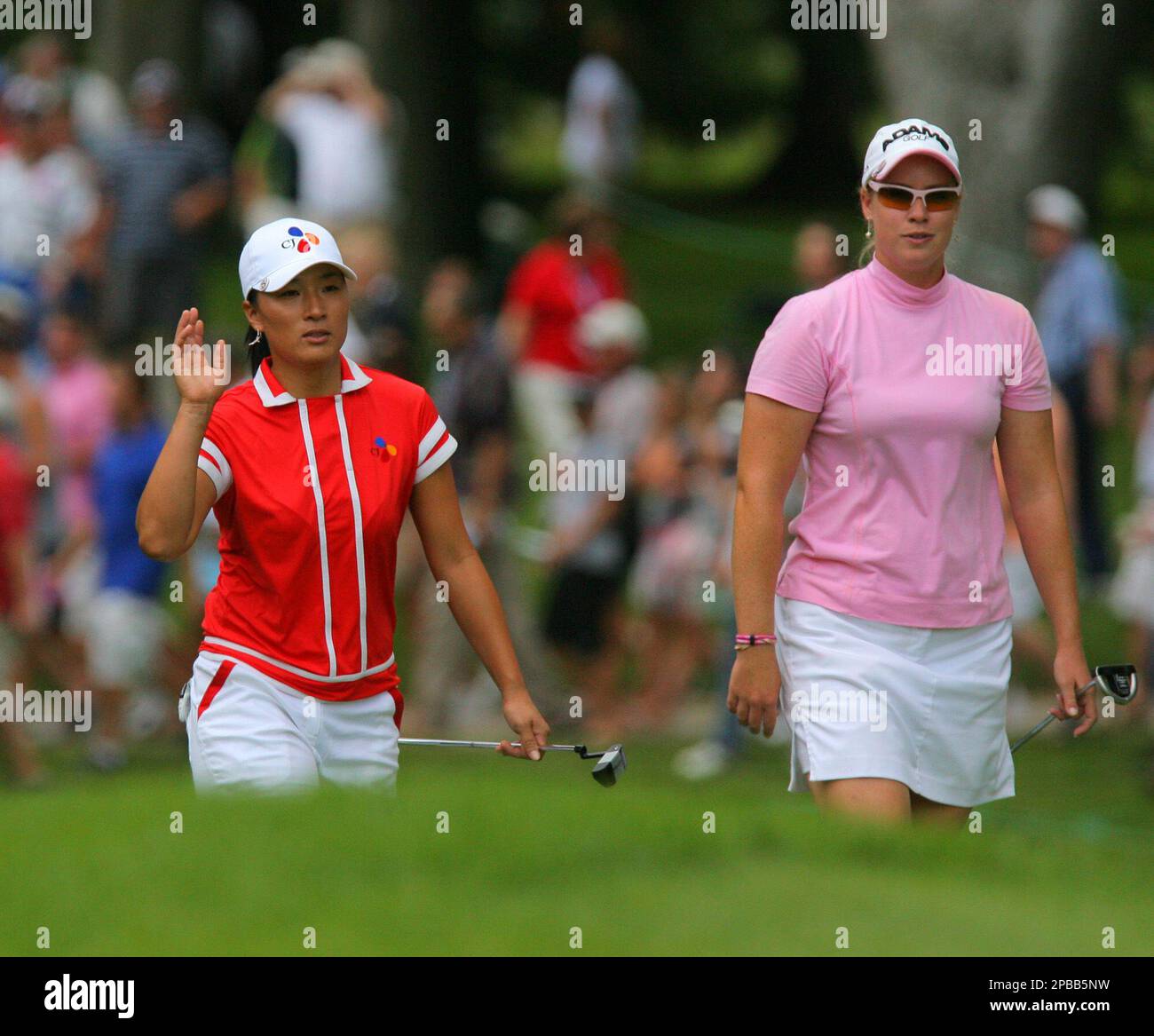 Se Ri Pak,left, of South Korea waves as she approaches the sixth green ...