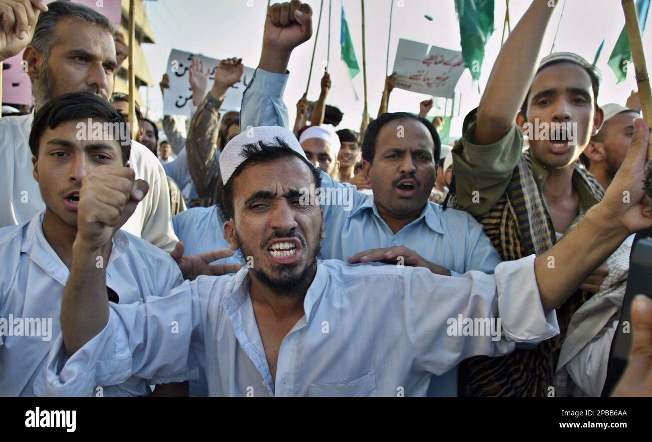Pakistani activists of Islamic parties alliance chant slogans at a ...