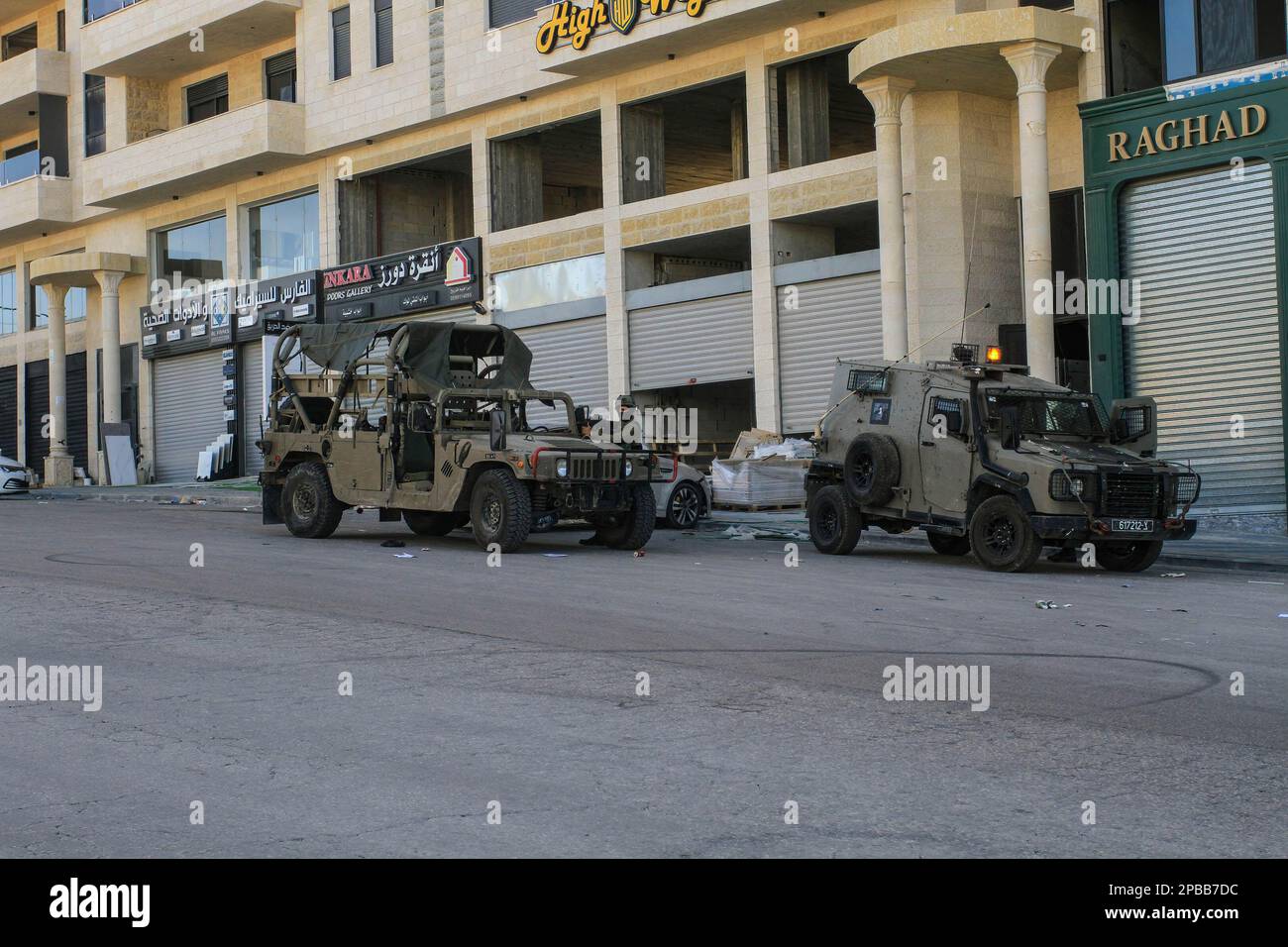 Nablus, Palestine. 12th Mar, 2023. Israeli military vehicles seen ...