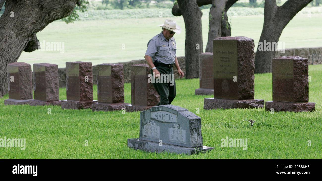 A park ranger walks through the Johnson family cemetery at the LBJ ...
