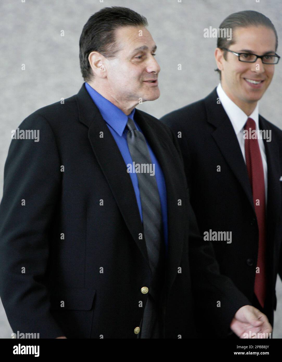 Retired Chicago policeman Anthony Doyle, left, arrives with an ...