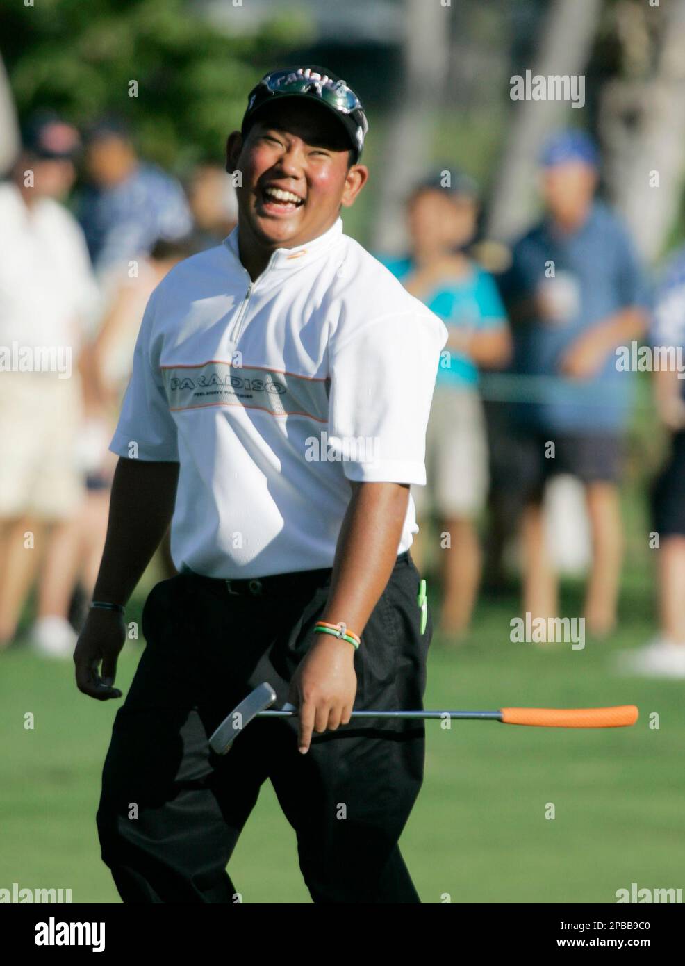 ** FILE ** Tadd Fujikawa, of Honolulu, smiles while walking up to the ...