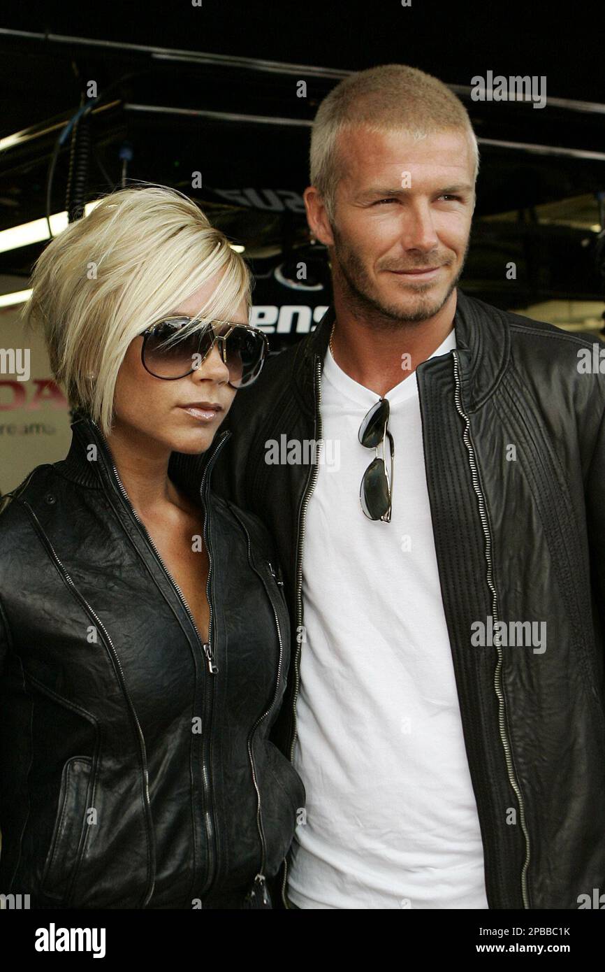 ** FILE ** Soccer star David Beckham, right, and his wife Victoria ...