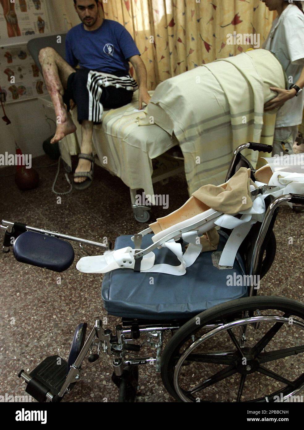 Israeli Army Lt.Asael Lubotzky, 24, is seen sit on the bed before he ...