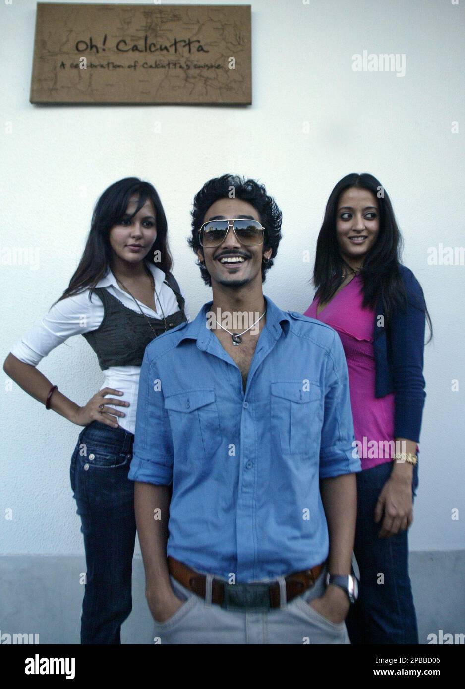 Indian Bollywood actors Shayan Munshi, center, his actress wife Peeya ...