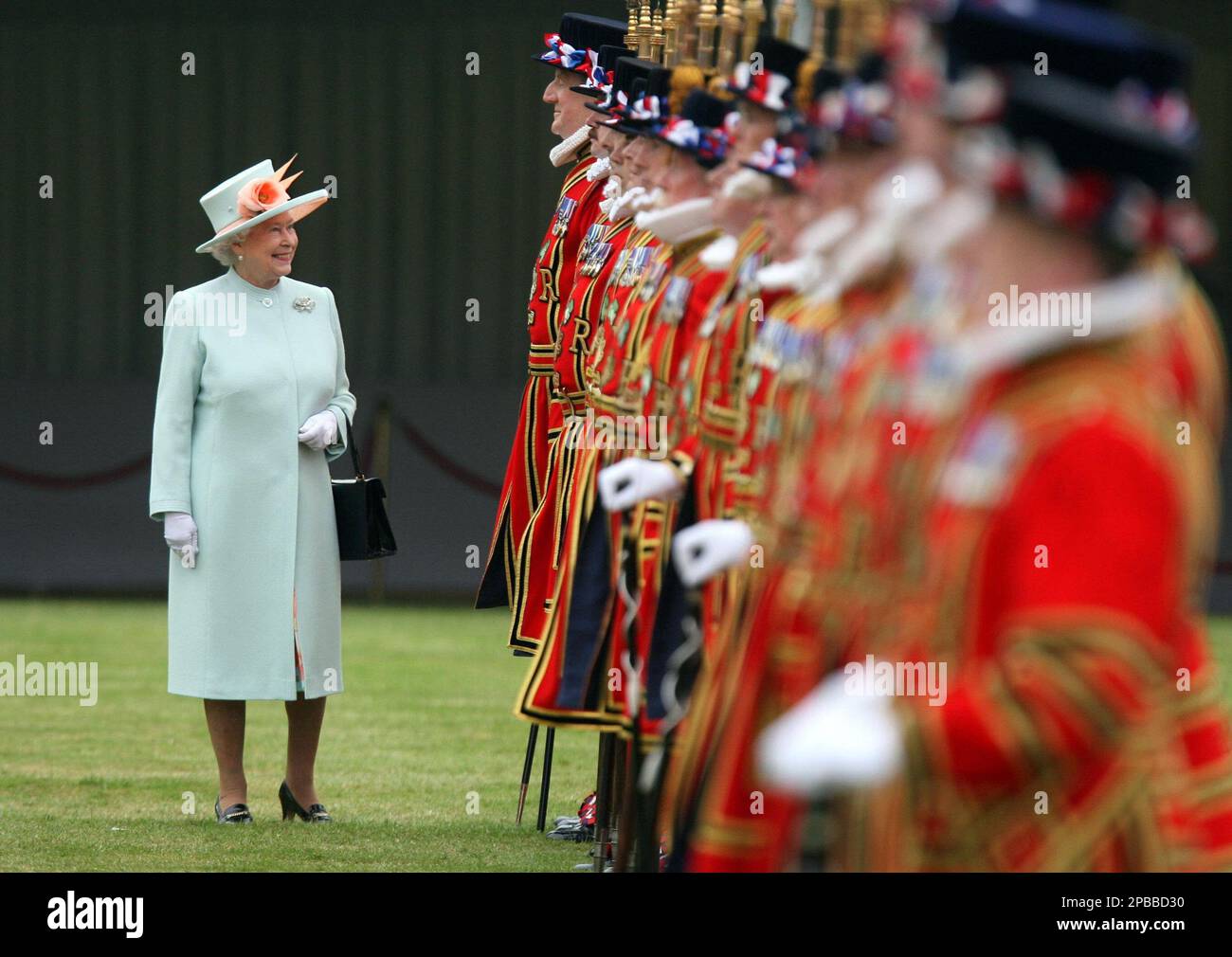 Britain's Queen Elizabeth II smiles as she inspects the Queen's Body ...