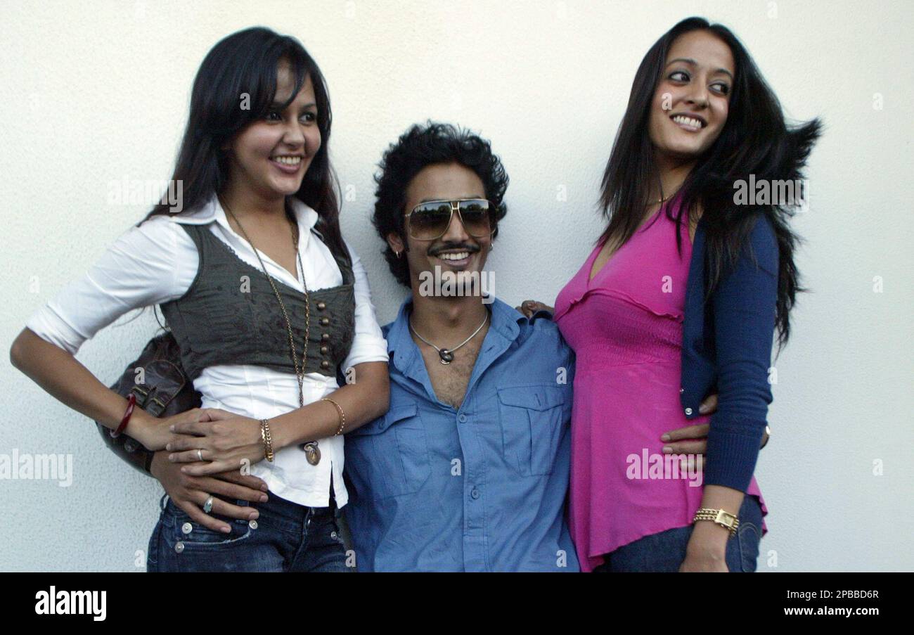 Indian Bollywood actors Shayan Munshi, center, his actress wife Peeya ...