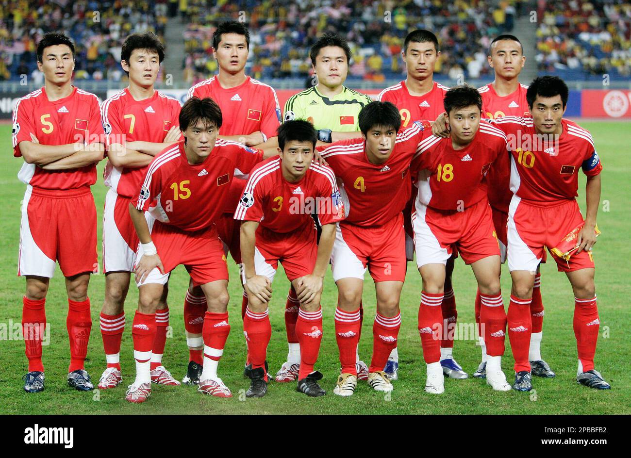 China's team players pose for photographers, from clock wise from left, Li Weifeng, Sun Jihai ...