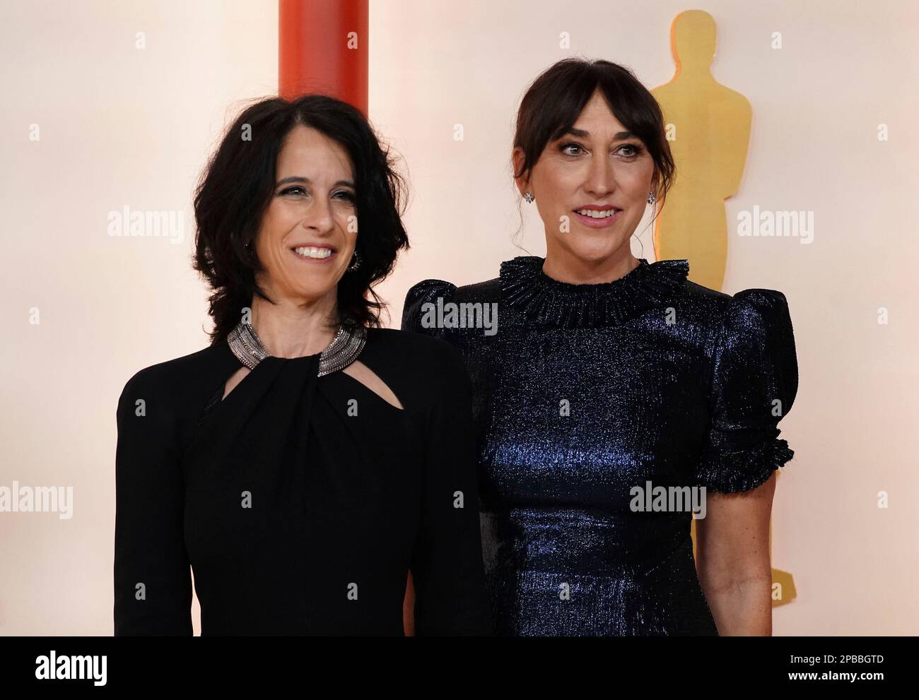 Beth Levison, left, and Anne Alvergue arrive at the Oscars on Sunday ...