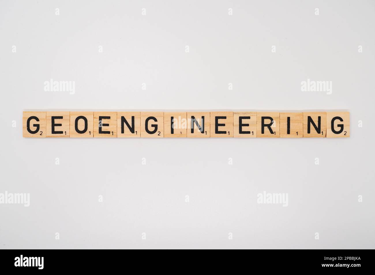 Wooden title spelling the word geoengineering isolated on a white ...