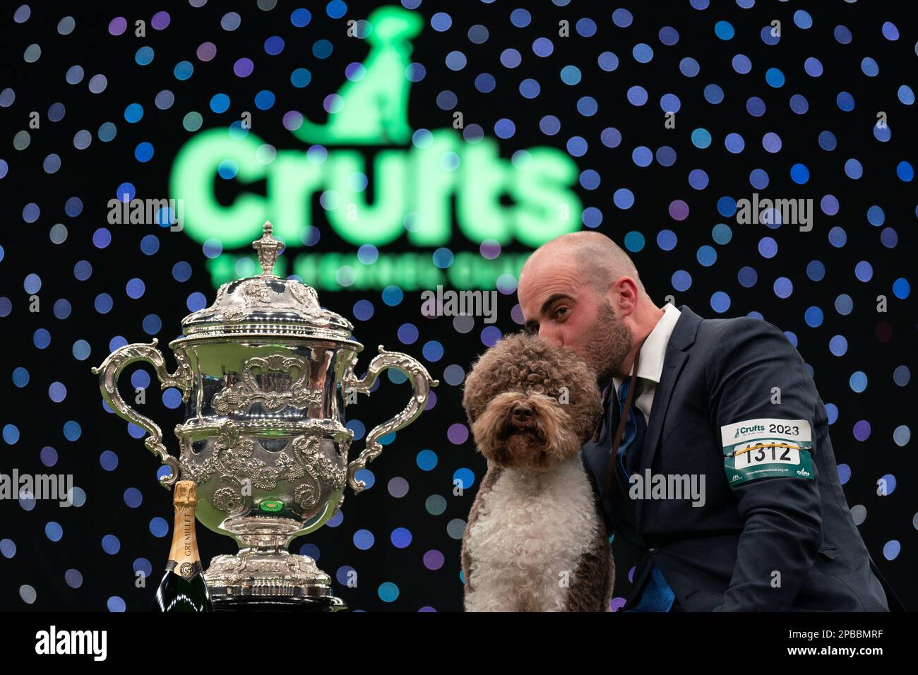 Orca the Lagotto Romagnolo with handler Javier Gonzalez Mendikote who ...