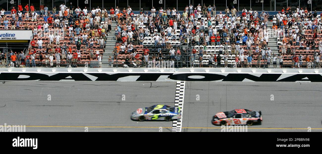 NASCAR Busch driver Kyle Busch (5) beats kevin Harvick (21) to the line ...