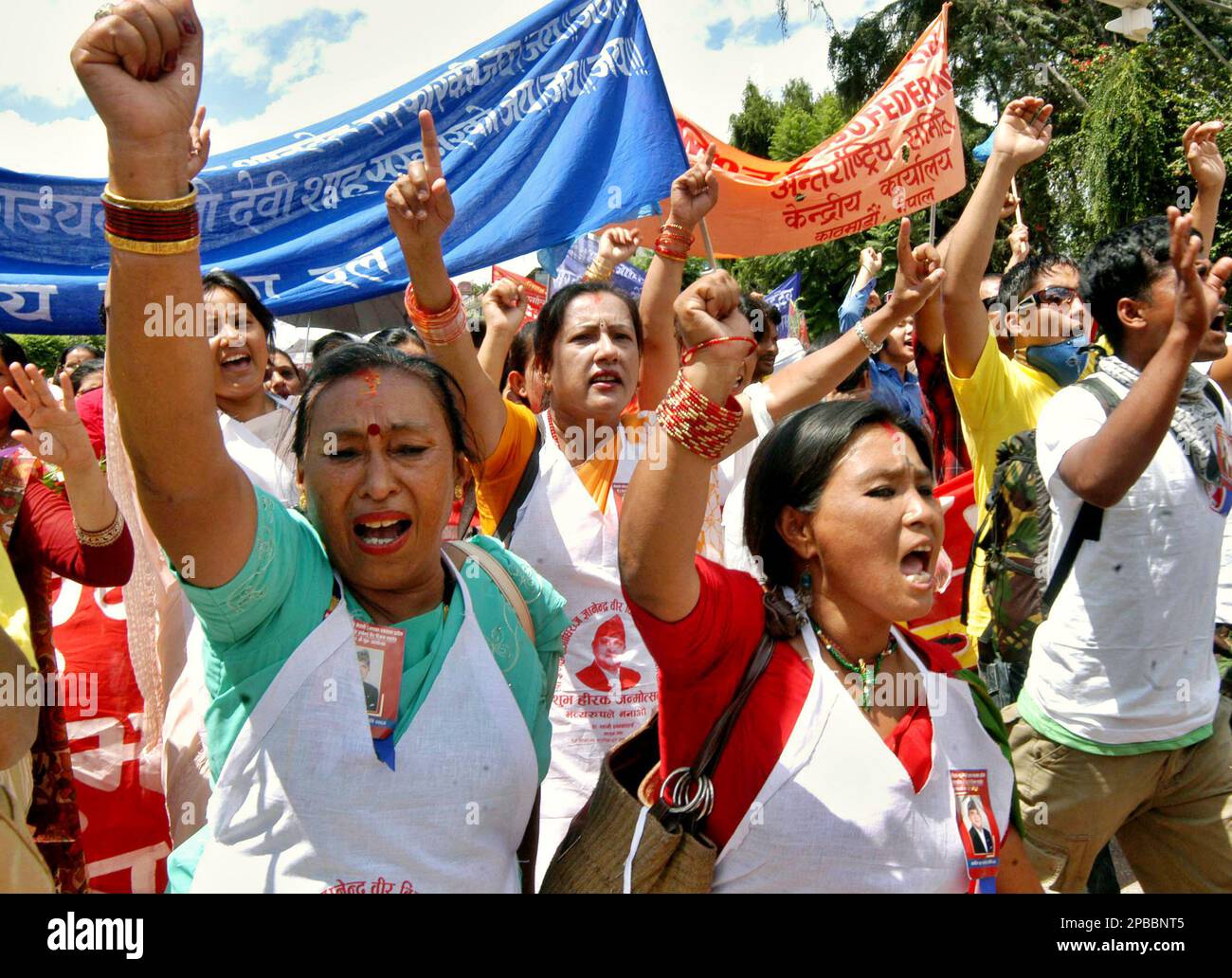 Supporters of Nepal's king Gyanendra, march to the Narayanhiti Royal Palace to extend greetings ...