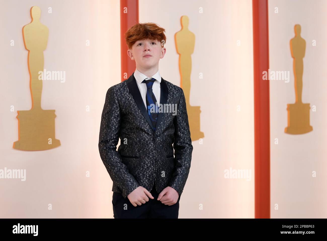 Gregory Mann arrives at the Oscars on Sunday, March 12, 2023, at the ...