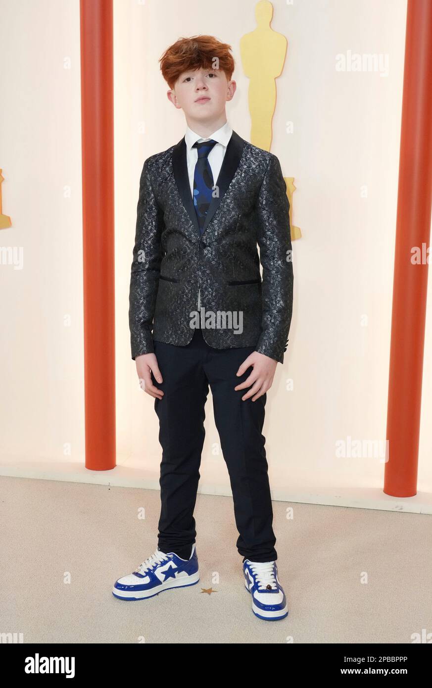 Gregory Mann arrives at the Oscars on Sunday, March 12, 2023, at the ...