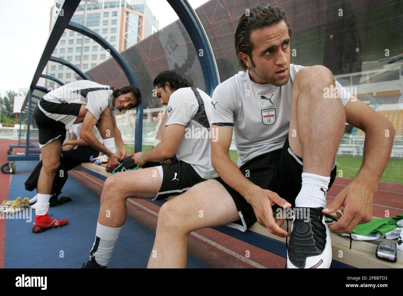 Ali Karimi, right, from Iranian national soccer team gets ready for a ...