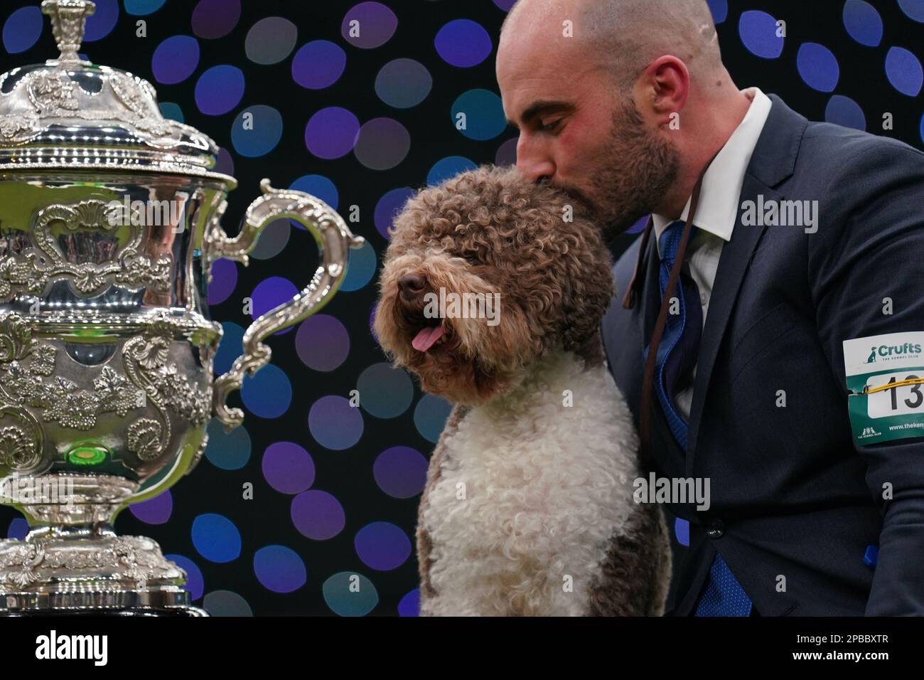 Orca the Lagotto Romagnolo with handler Javier Gonzalez Mendikote who ...