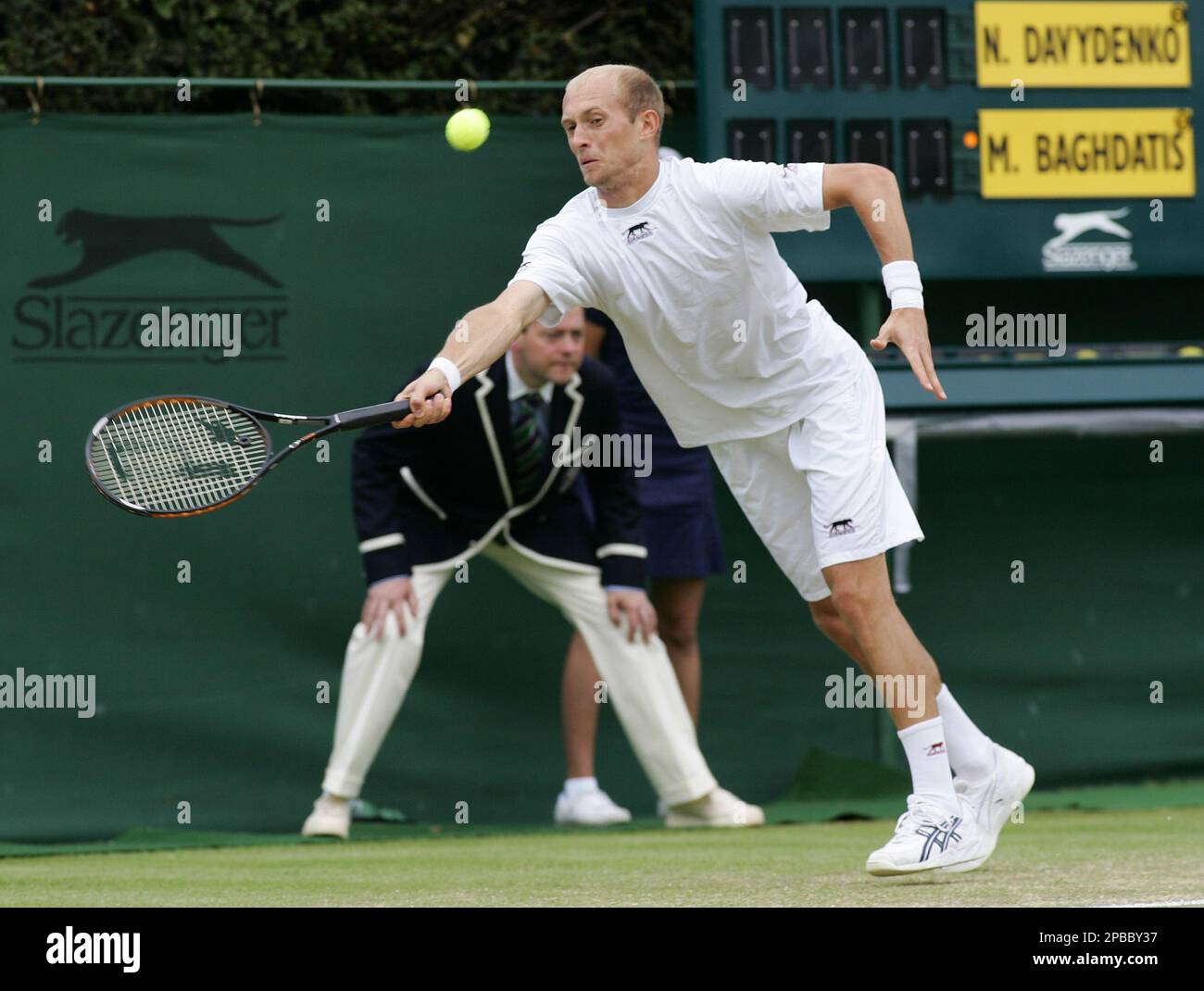 Russia's Nikolay Davydenko returns to Marcos Baghdatis of Cyprus during ...
