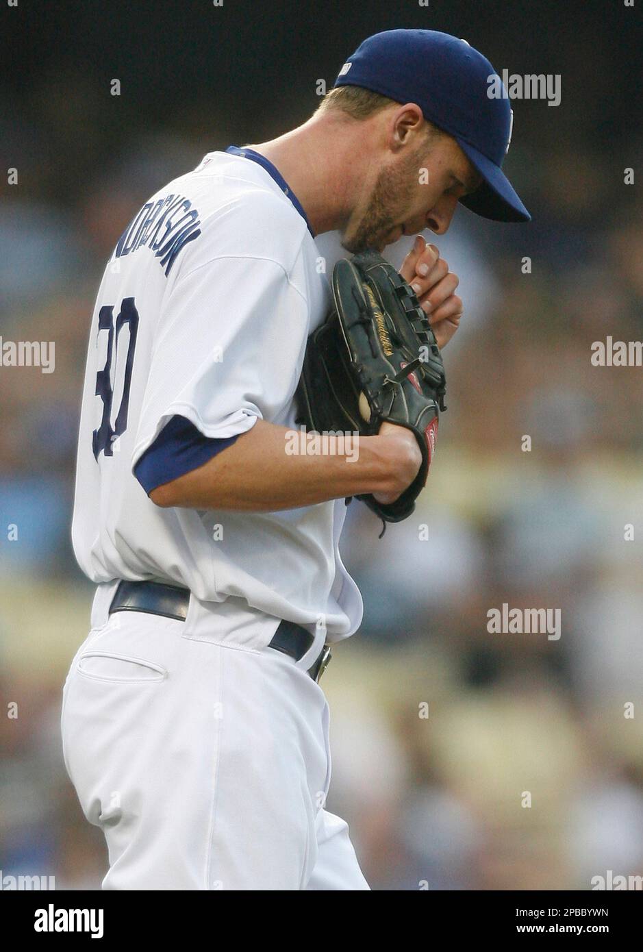 Los Angeles Dodgers pitcher Mark Hendrickson reacts after giving up two ...