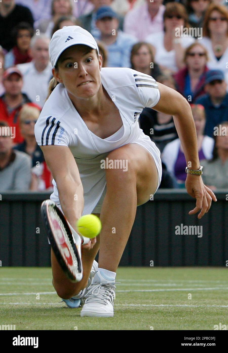 Justine Henin returns to Serena Williams during their Women's Singles ...
