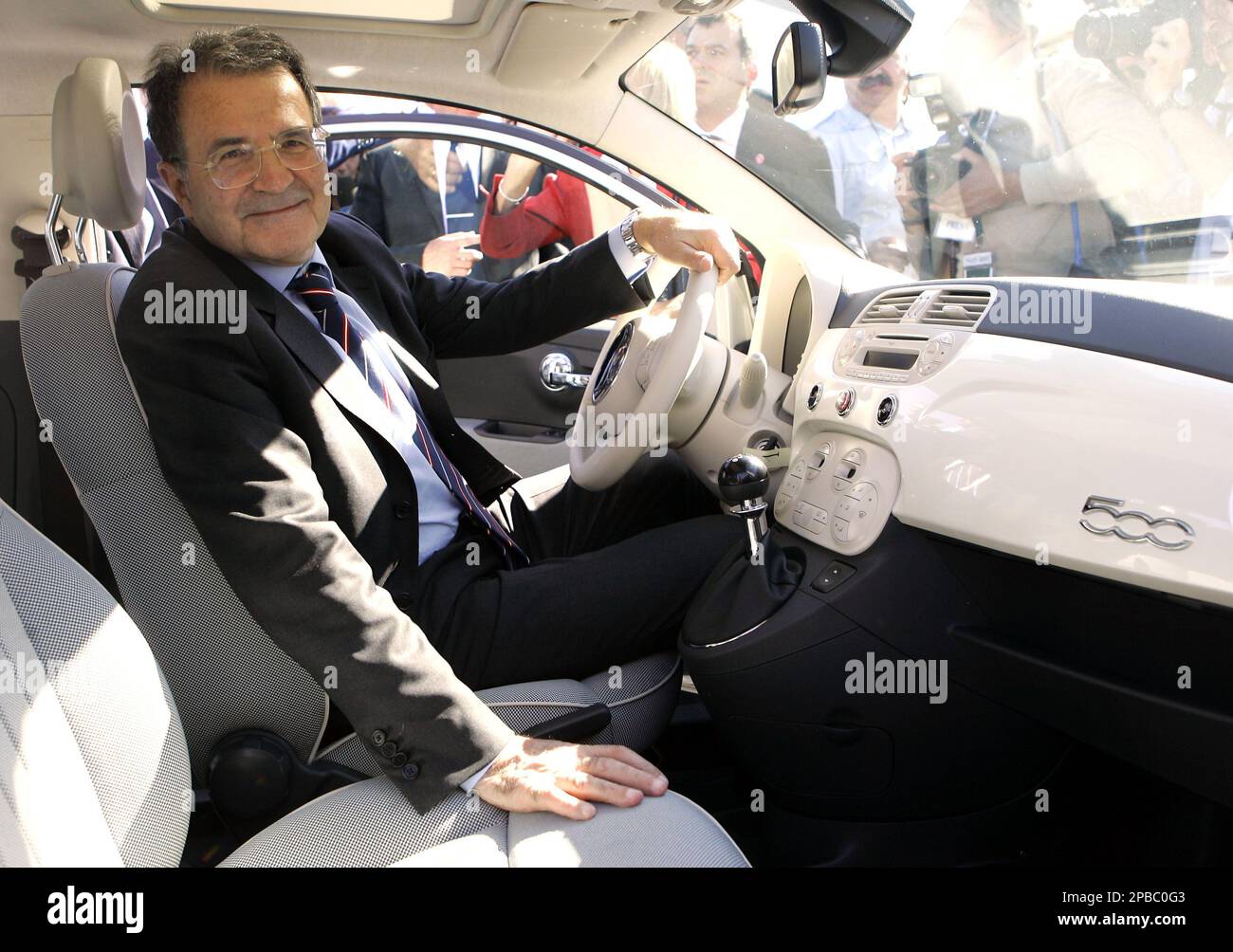 Italian prime minister Romano Prodi sits inside the new Fiat 500 during ...