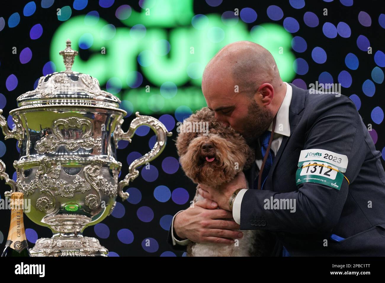 Orca the Lagotto Romagnolo with handler Javier Gonzalez Mendikote who ...