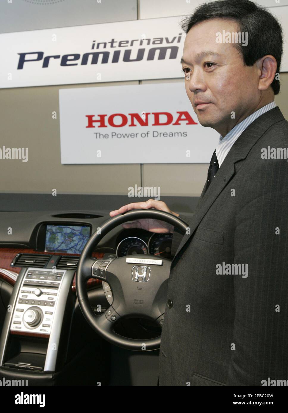 Honda Motor Co.'s Deputy Chief Operating Officer Manabu Nishimae poses with a mockup model of ...