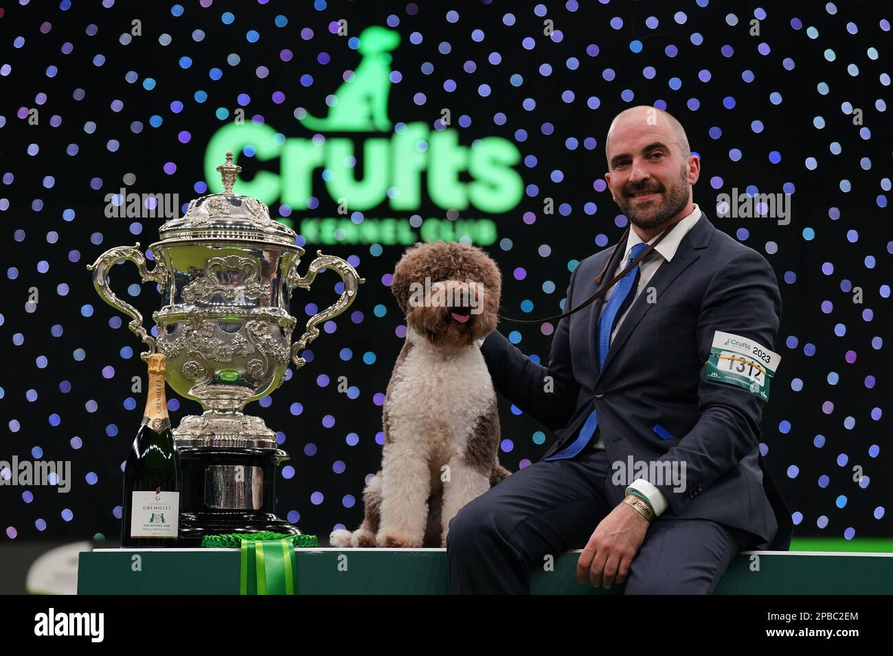 Orca the Lagotto Romagnolo with handler Javier Gonzalez Mendikote who ...