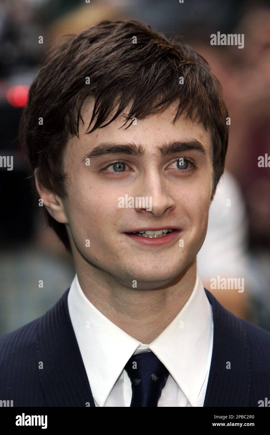 Actor Daniel Radcliffe poses for the photographers as he arrives for ...