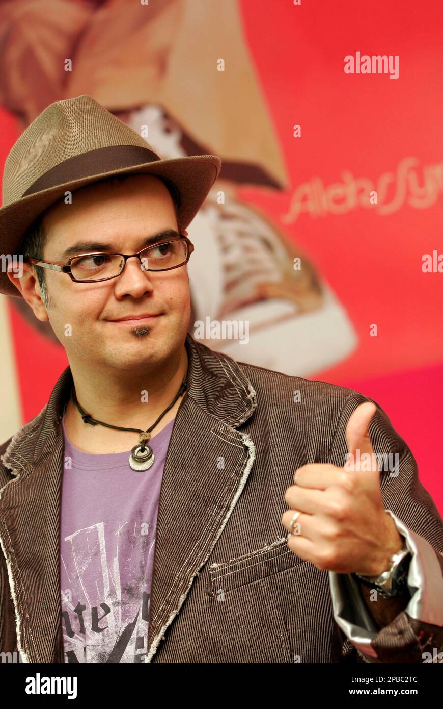 Mexican singer Aleks Syntek gives the thumbs up sign during the ...