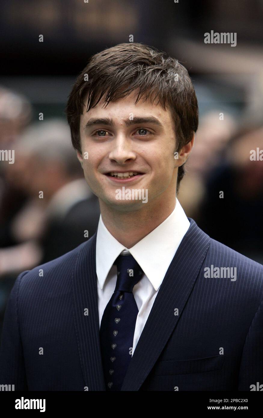 Actor Daniel Radcliffe poses for the photographers as he arrives for ...