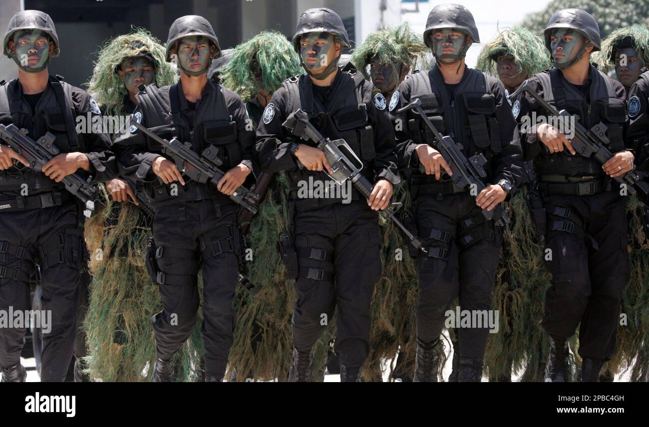 Philippine Army snipers march with commandos from the Philippine Air ...