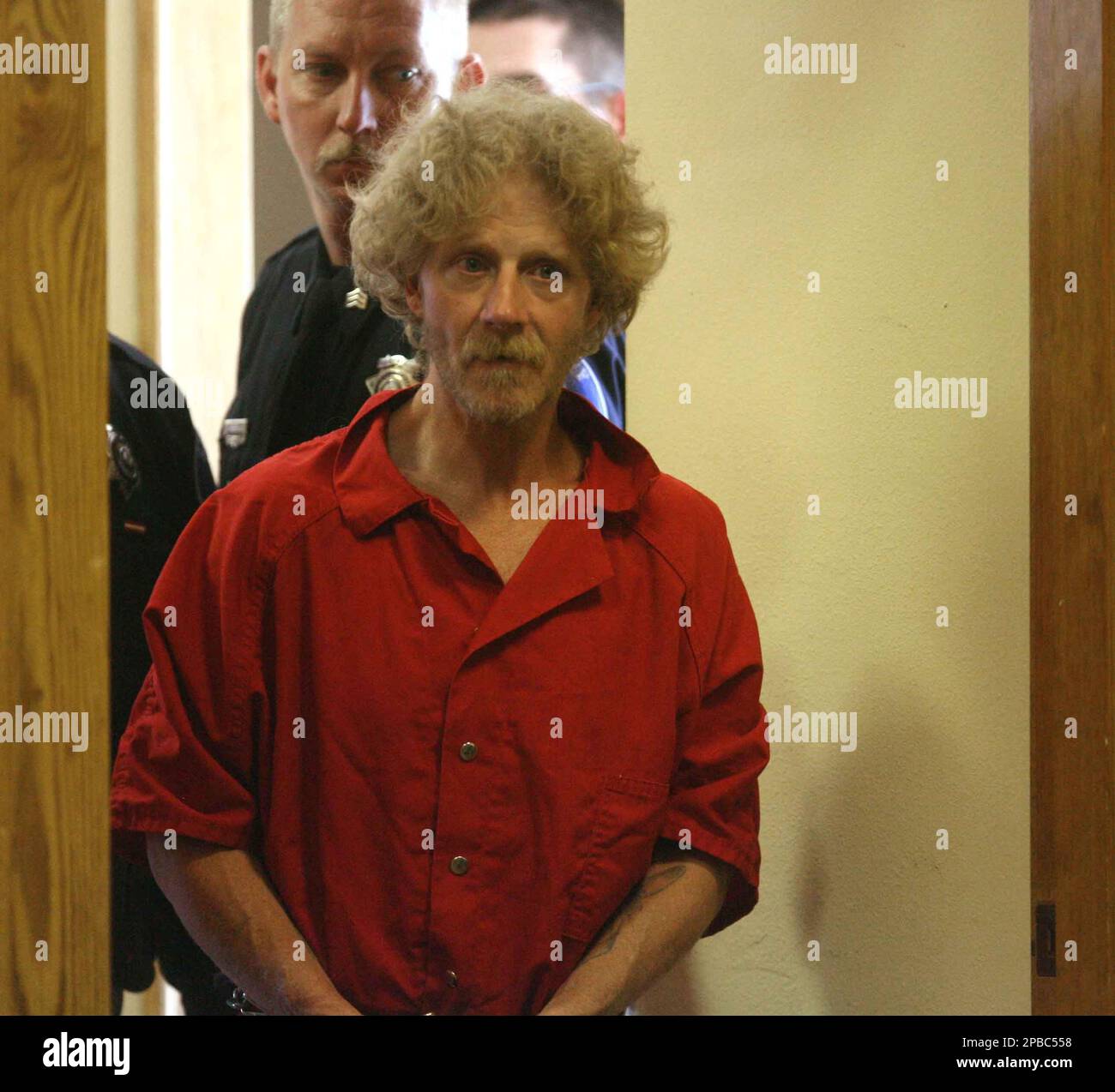 Robert A. Amos arrives in a Park County court in Fairplay, Colo ...