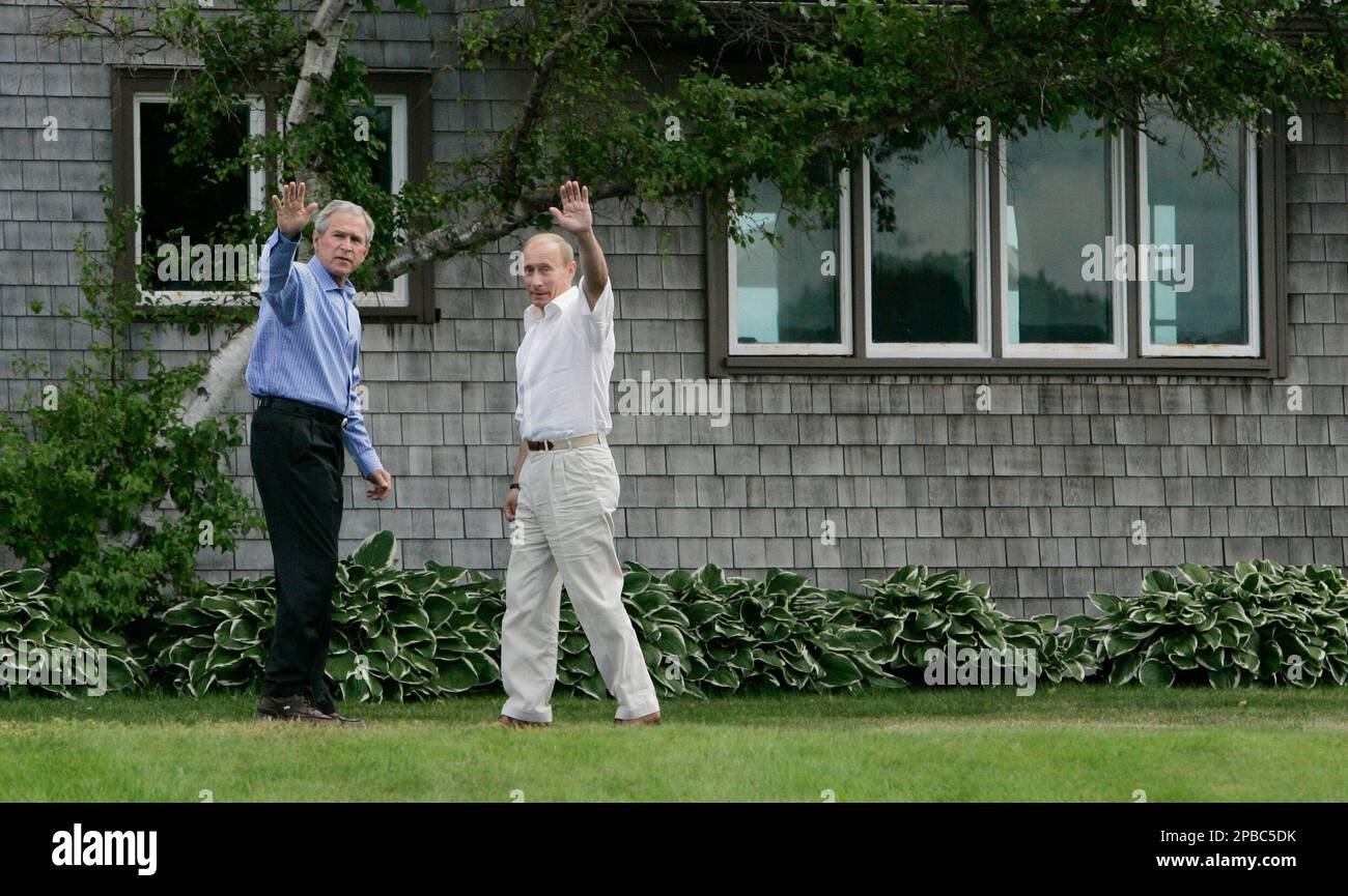 President Bush, left, and Russian President Vladimir Putin turn and ...