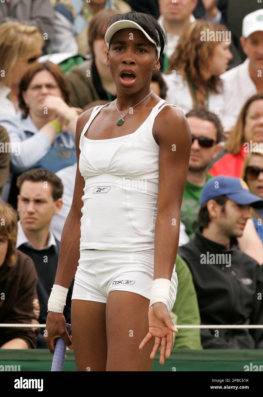 Venus Williams reacts to a missed shot, on her way to defeating Japan's ...