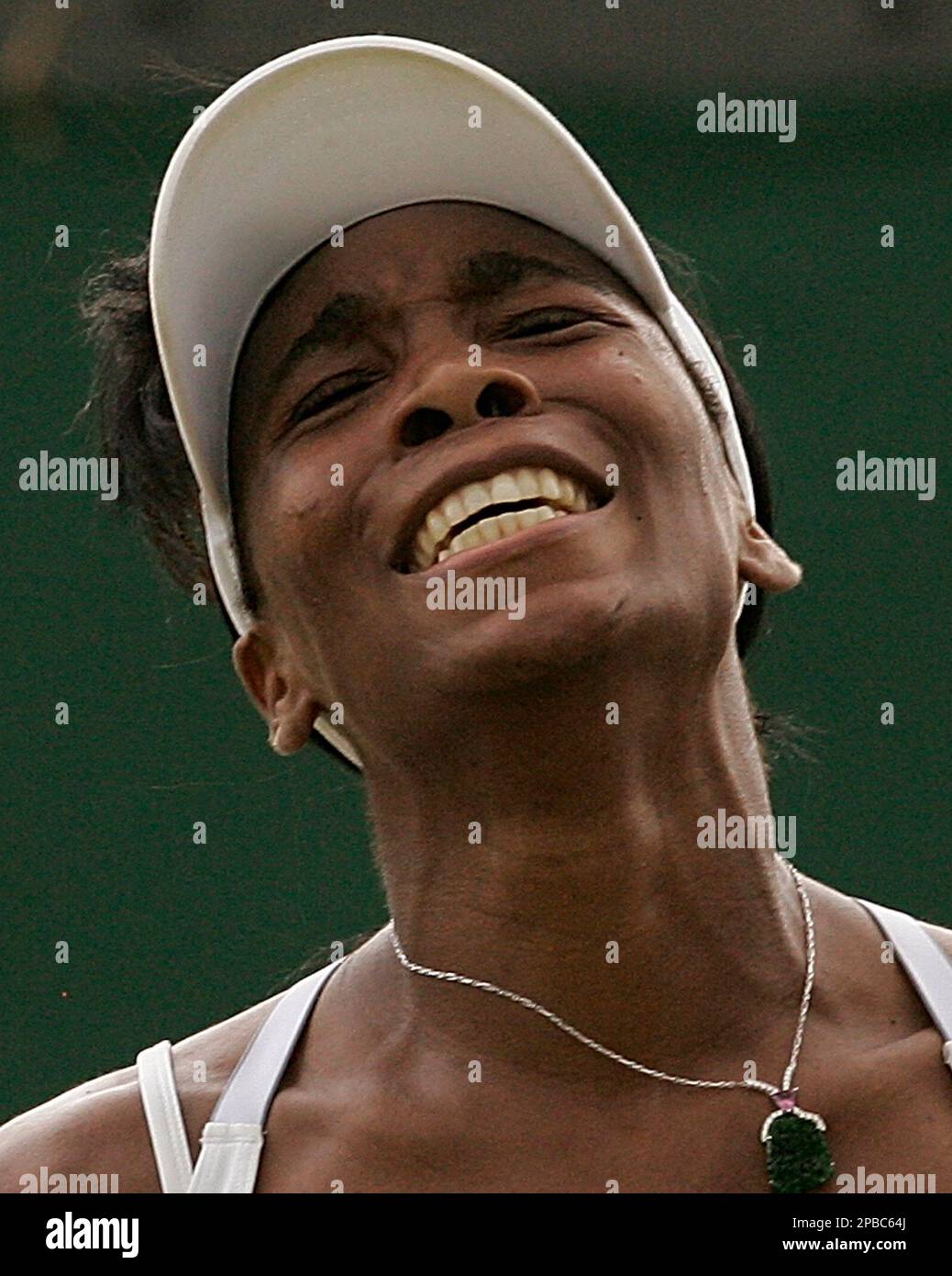Venus Williams reacts on her way to defeating Japan's Akiko Morigami in ...