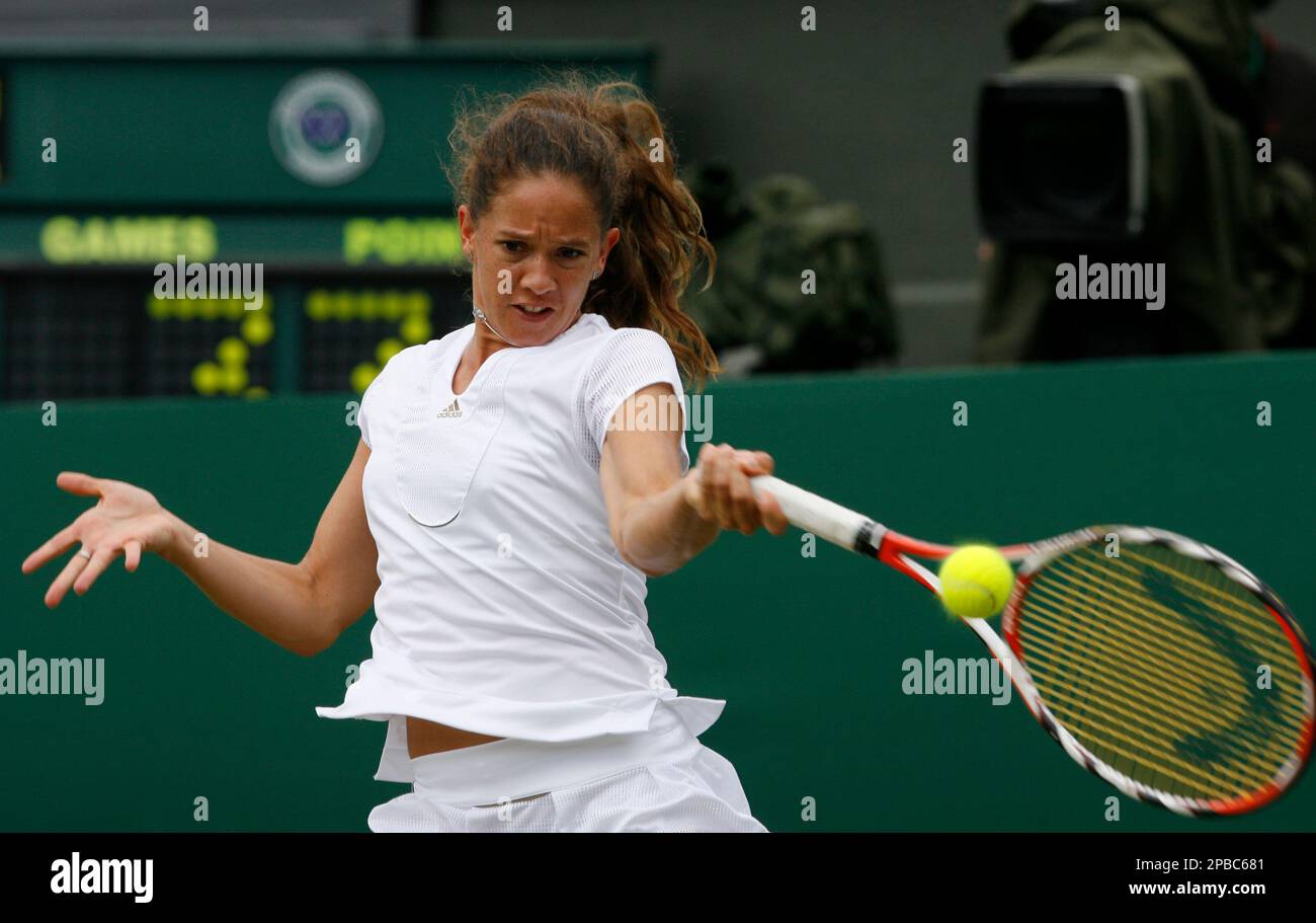 Switzerland's Patty Schnyder returns to Belgium's Justine Henin, during ...