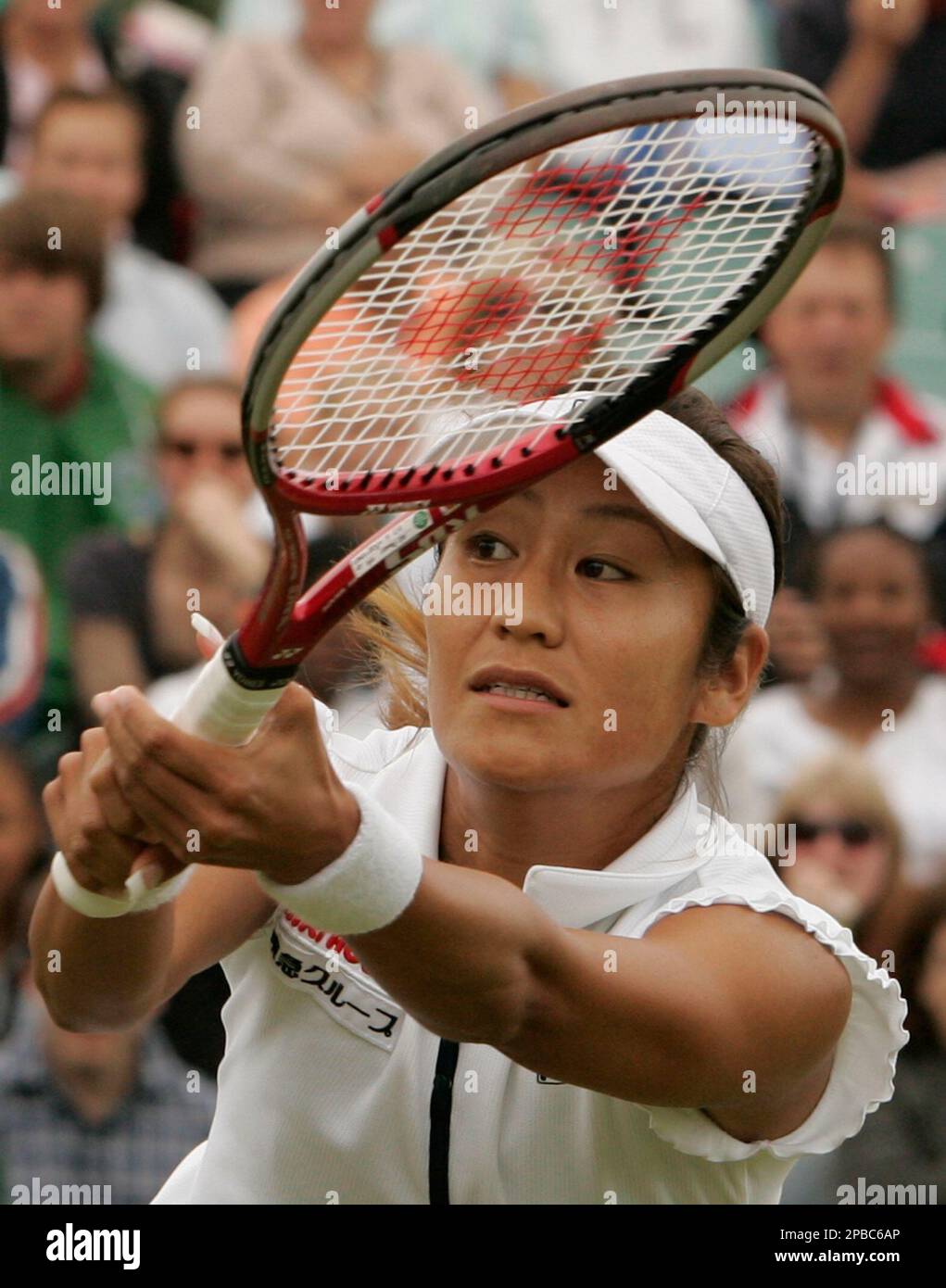 Japan's Akiko Morigami returns to Venus Williams of the US, during ...