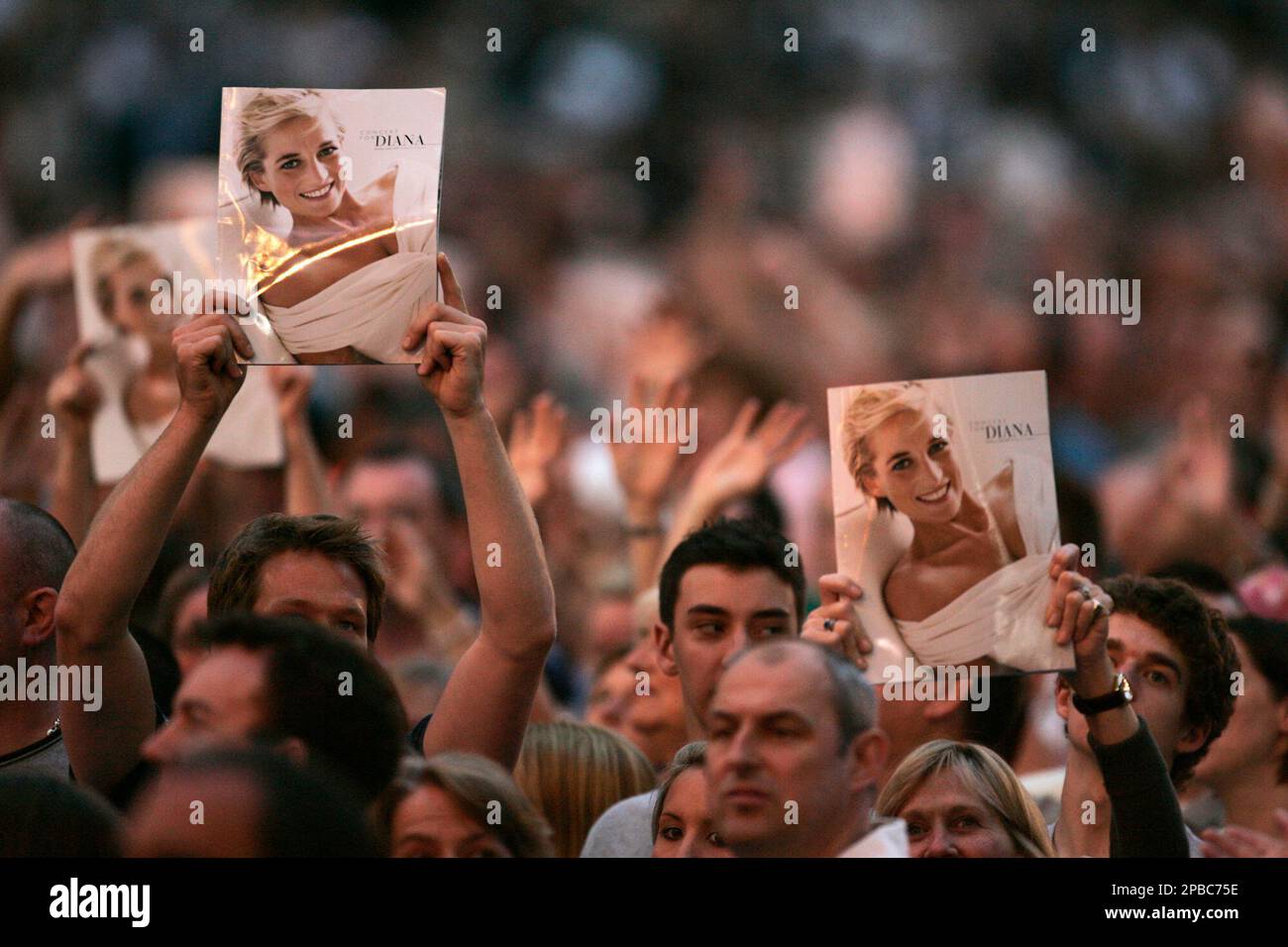 The crowd with posters of Princess Diana during the Concert for Diana ...