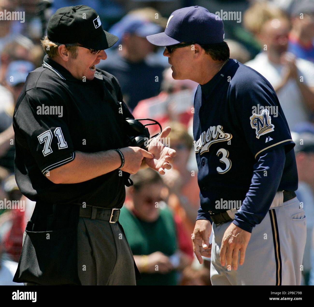 Milwaukee Brewers manager Ned Yost, right, argues a call at the plate ...