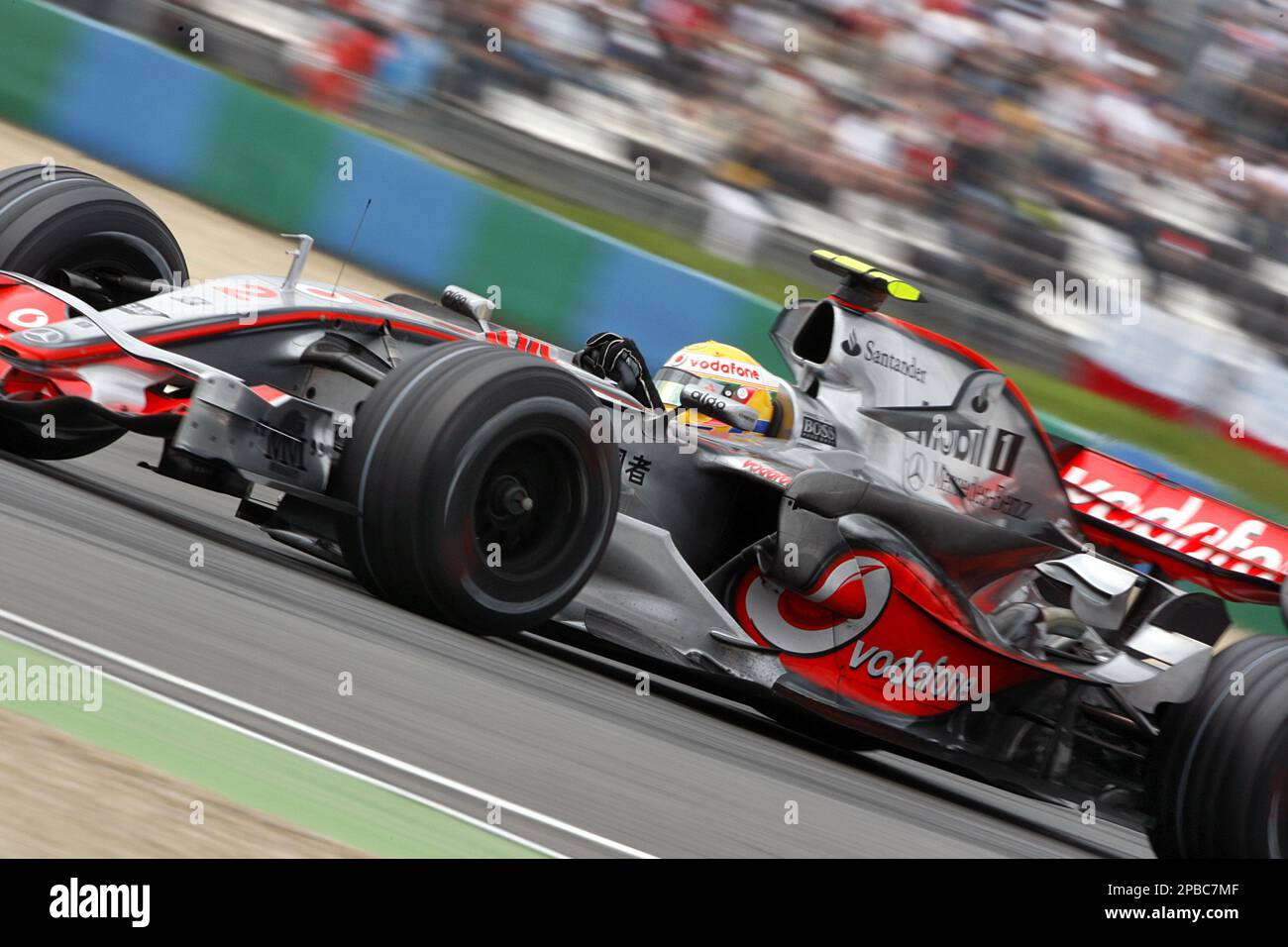 McLaren Mercedes F1 driver Lewis Hamilton of Britain steers his car ...