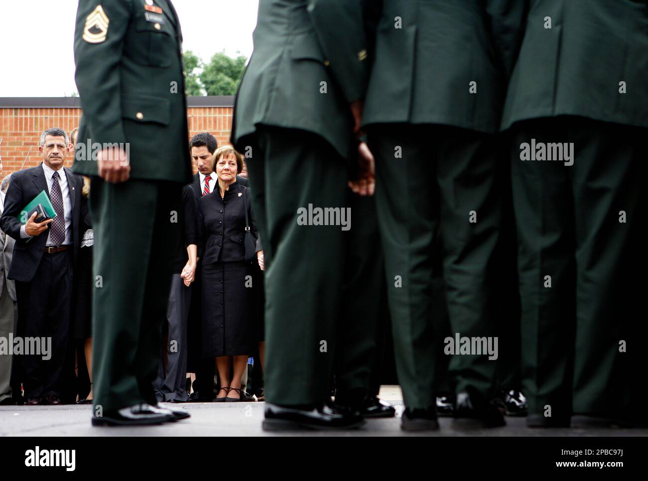 Family members of 1st Lt. Daniel Riordan including his father, Rick ...