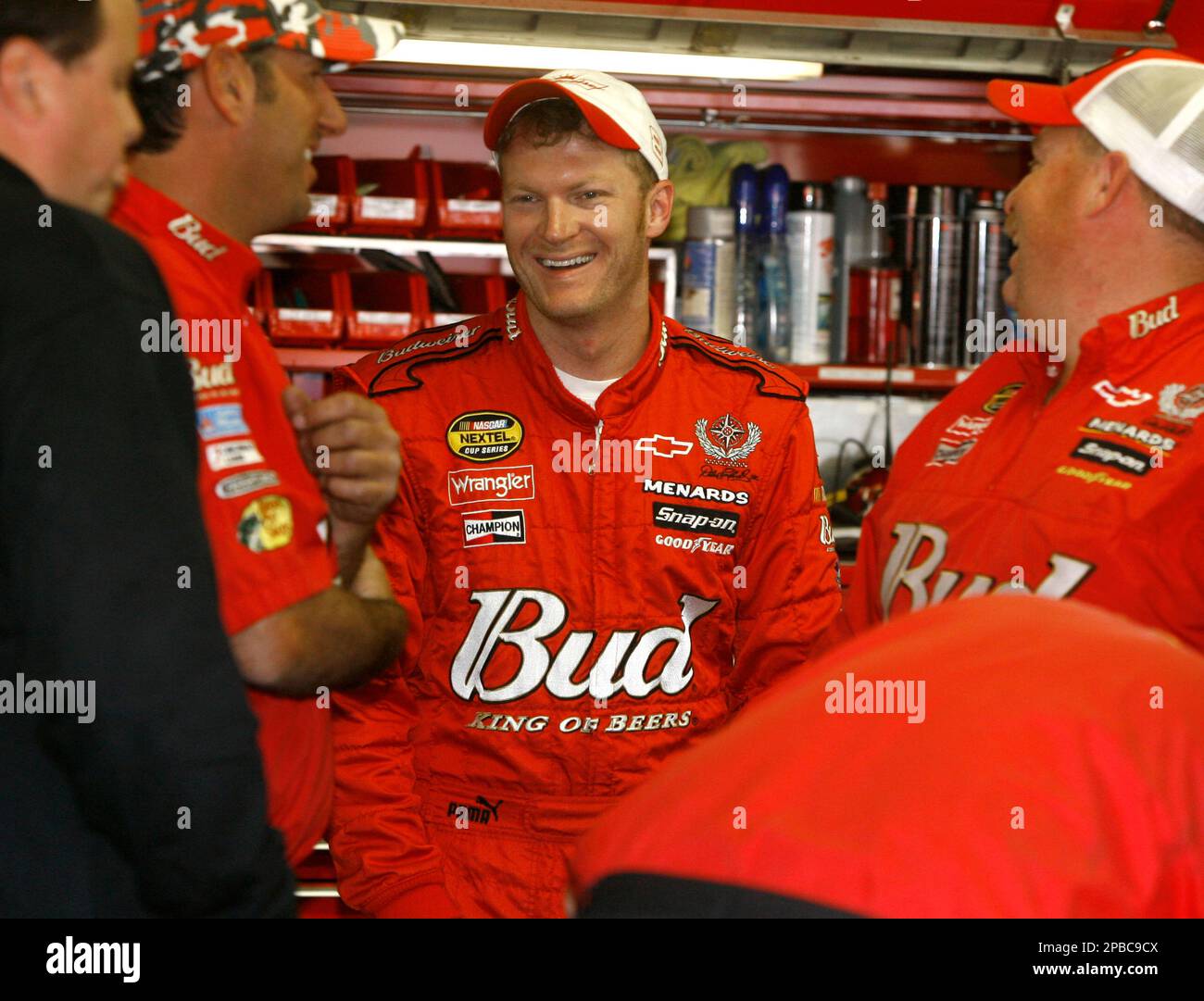 NASCAR driver Dale Earnhardt Jr., center, laughs with crew members ...