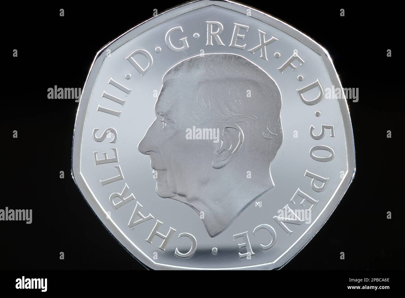 A 2022 50p coin which was the first coin to feature King Charles III ...