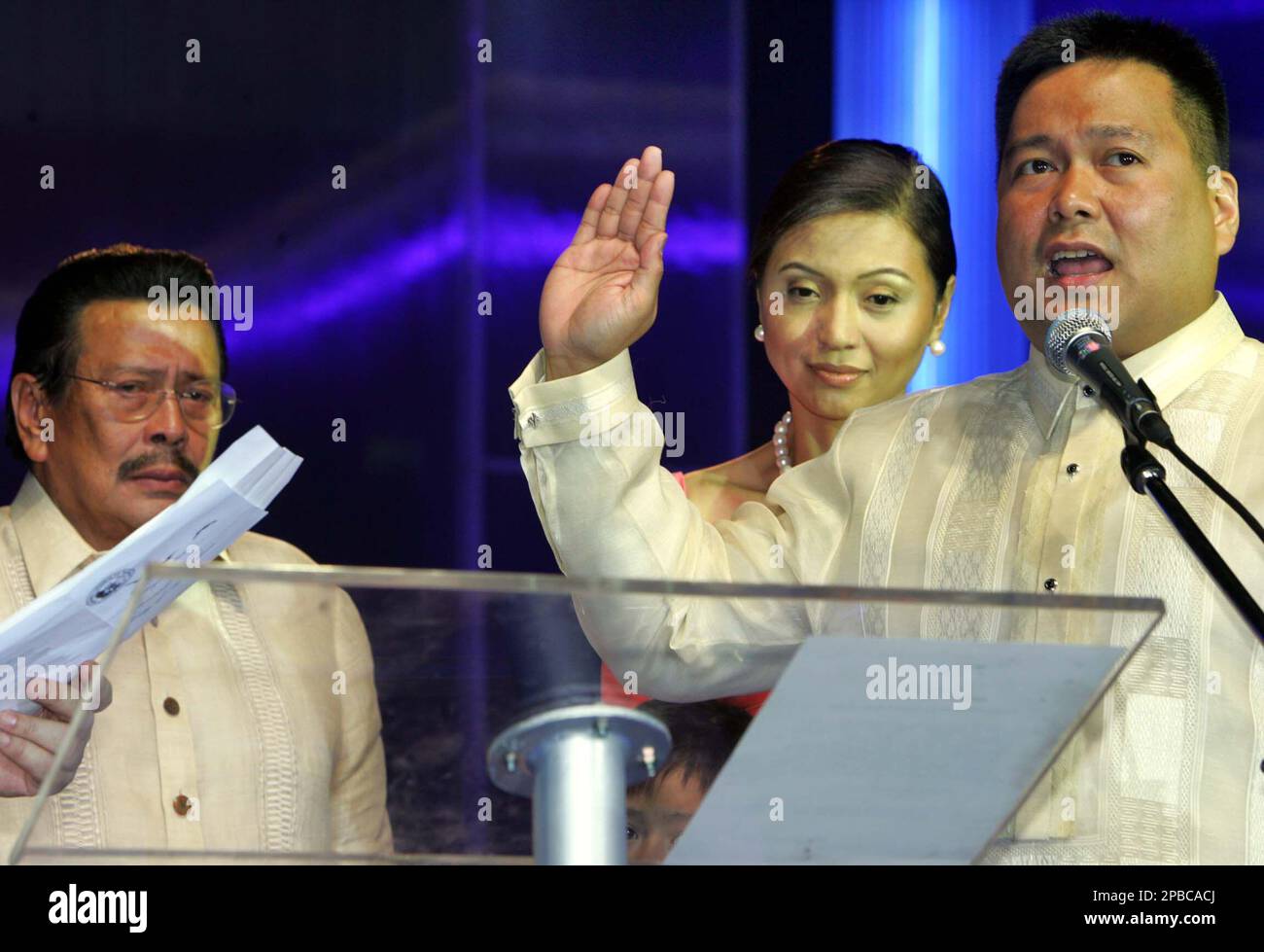 Deposed Philippine President Joseph Estrada left, watches as his son ...
